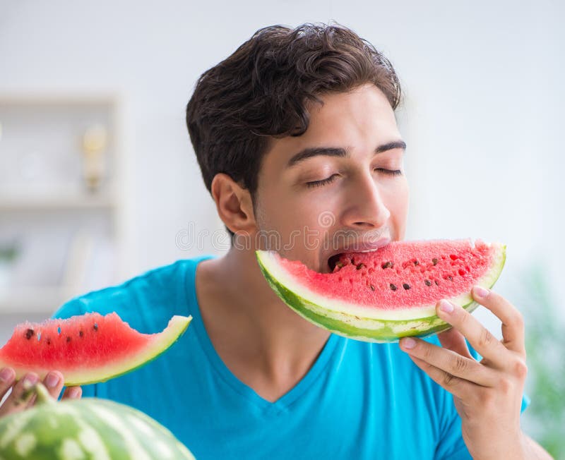 Man Eating Watermelon at Home Stock Image - Image of eating, happiness ...