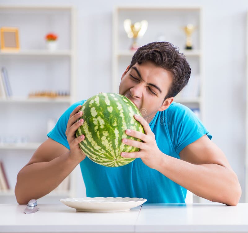 Man Eating Watermelon at Home Stock Image - Image of nature, fresh ...