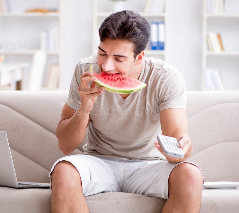Man Eating Watermelon at Home Stock Image - Image of melon, refreshment ...