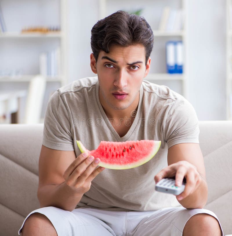 Man Eating Watermelon at Home Stock Image - Image of dessert, cutting ...