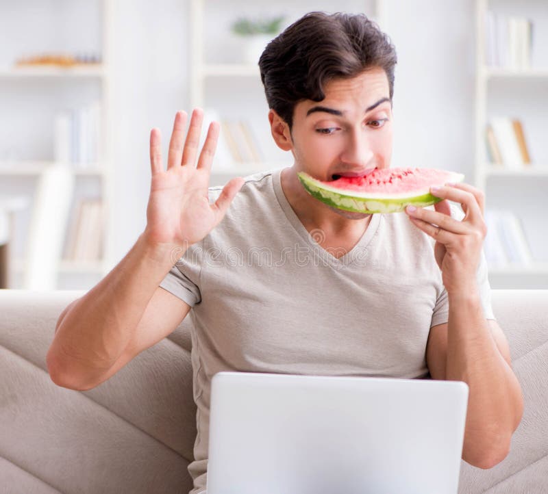 Man Eating Watermelon at Home Stock Image - Image of happiness, piece ...