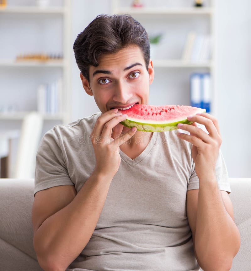 Man Eating Watermelon at Home Stock Image - Image of cutting, nature ...