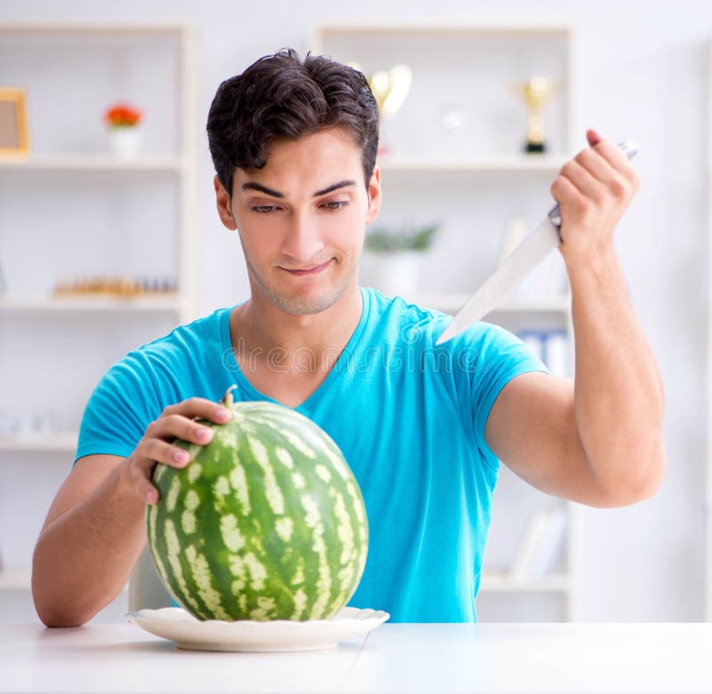 Man Eating Watermelon at Home Stock Photo - Image of nutrition, dessert ...