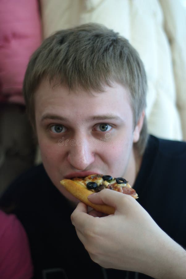 The man eats a pizza stock image. Image of irony, muscle - 13045719