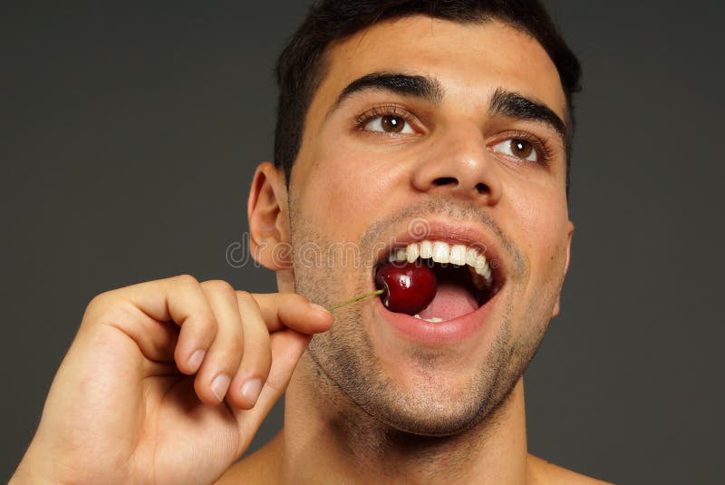 Man Eats Red Fresh Cherry Stock Photos - Free & Royalty-Free Stock ...