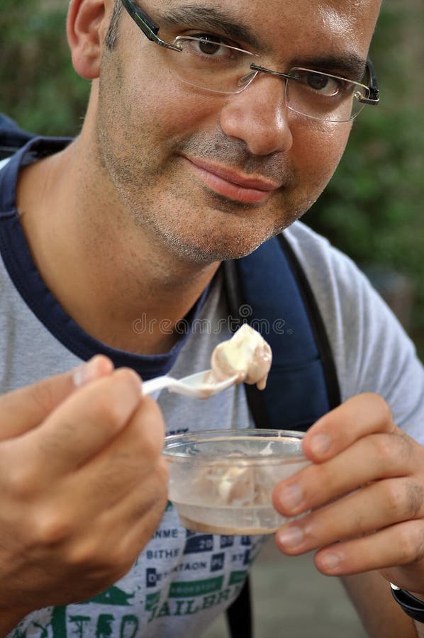 Man eatting Ice cream. stock image. Image of vacation - 15519425