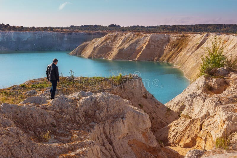 Man on Edge of Chalk Quarry Stock Image - Image of outdoor, nature ...