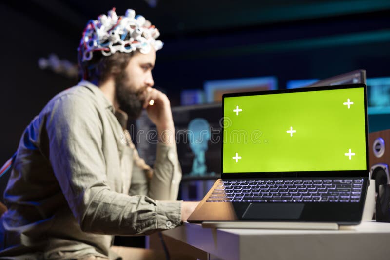 Man with EEG Headset Transferring Mind into Virtual World, Chroma Key ...