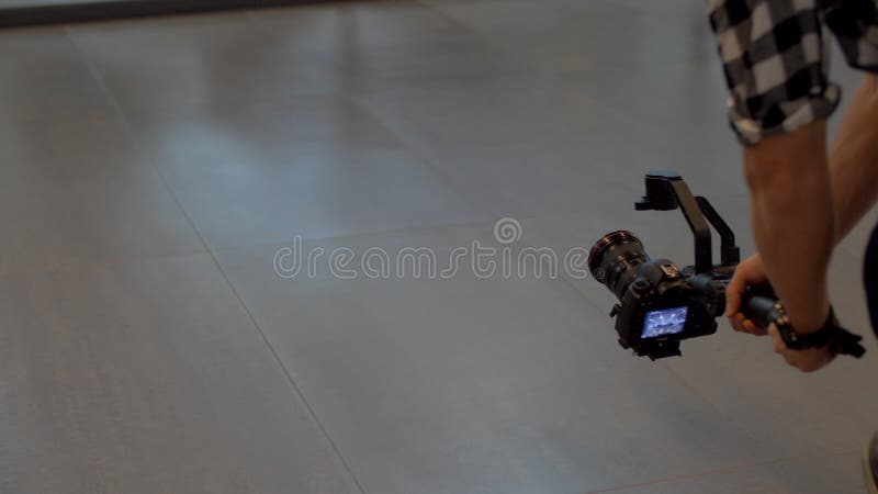 Man with Electronic Three-axis Steadicam Stock Video - Video of earth ...