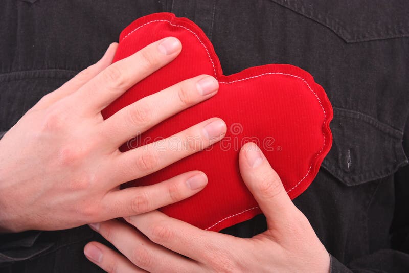 Man embracing a heart stock photo. Image of valentine - 12575438