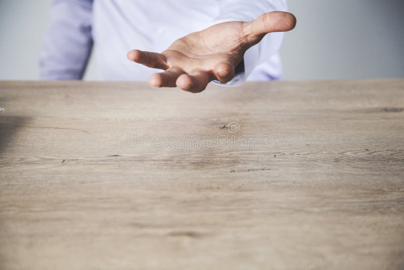 Man empty palm on desk stock image. Image of desk, showing - 152570501