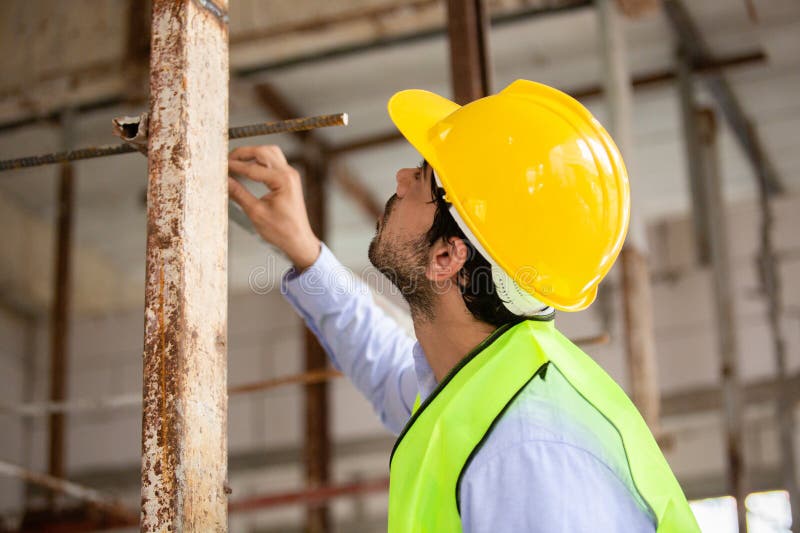 Man Engineer Builder House Construction Check the Quality of the ...