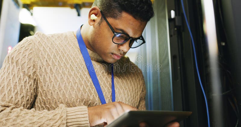 Man, Engineer and Tablet in Server Room for Software, Update System and Diagnostics Solution ...