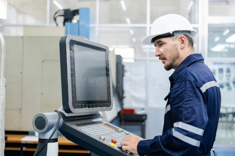 Man Engineer Using Computer Controlling Cnc Machine at Workshop ...