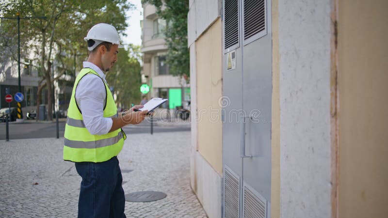 Man Engineer Working Architect Project Outdoors. Foreman Writing Notes ...