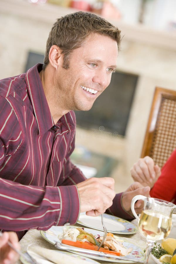 Man Enjoying Christmas Dinner Stock Photo - Image of happy, christmas ...