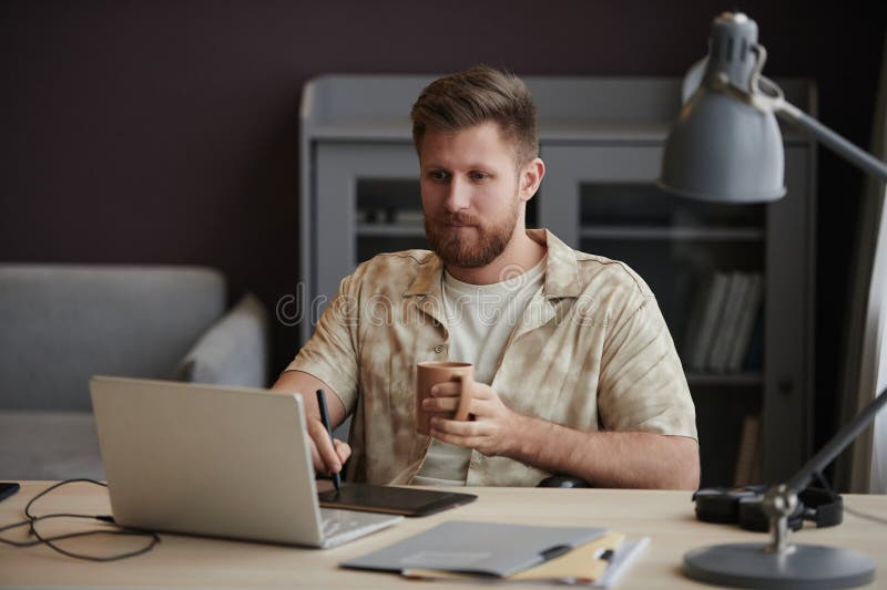 Man Enjoying Cup of Coffee Working from Home Stock Image - Image of ...