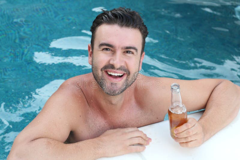 Man Enjoying a Fresh Alcoholic Drink in Swimming Pool Stock Photo ...