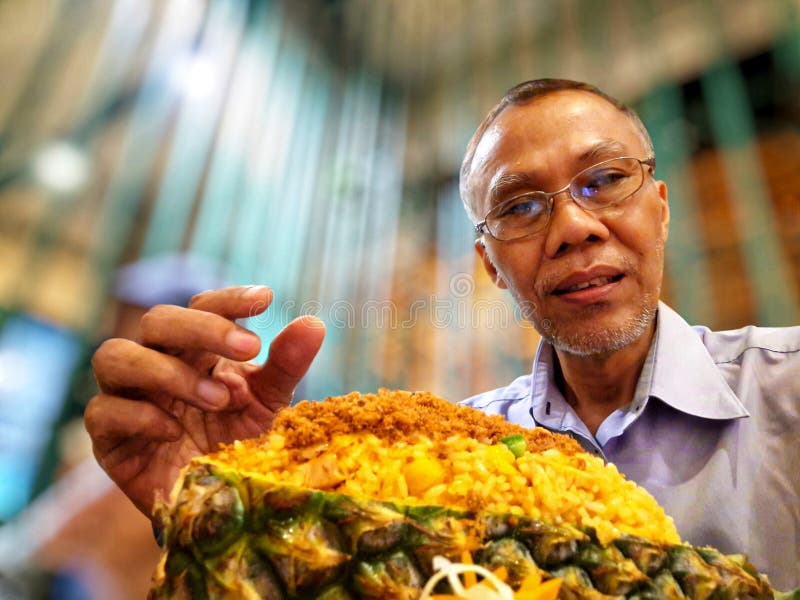 Man Enjoying Pineapple Fried Rice Menu Stock Photos - Free & Royalty ...