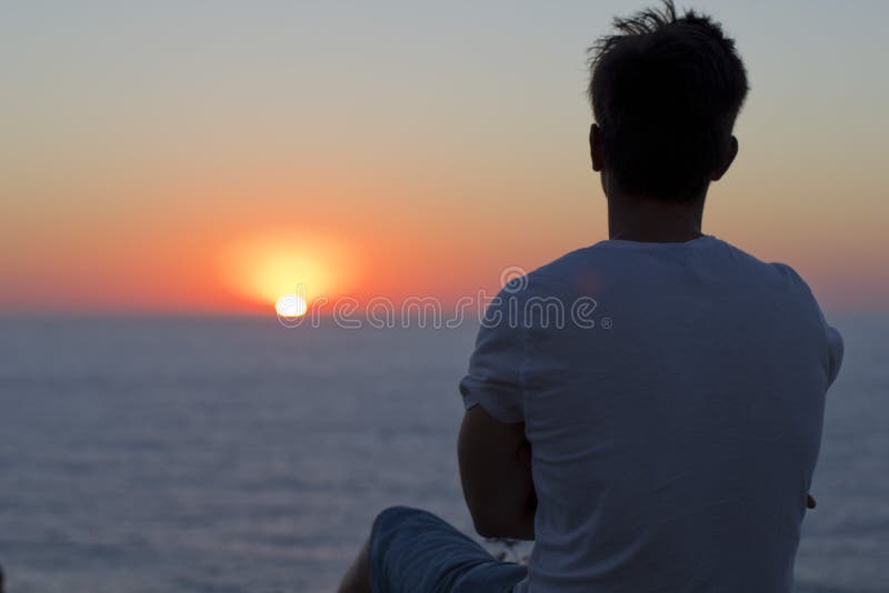Man enjoying sunset stock photo. Image of dusk, sitting - 32925130