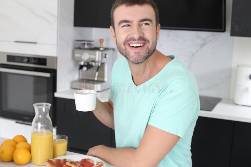 Man Enjoying a Traditional Breakfast Stock Photo - Image of beverage ...
