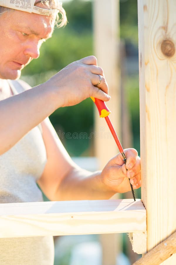Man enjoys working stock photo. Image of manual, screwdriver - 58428390