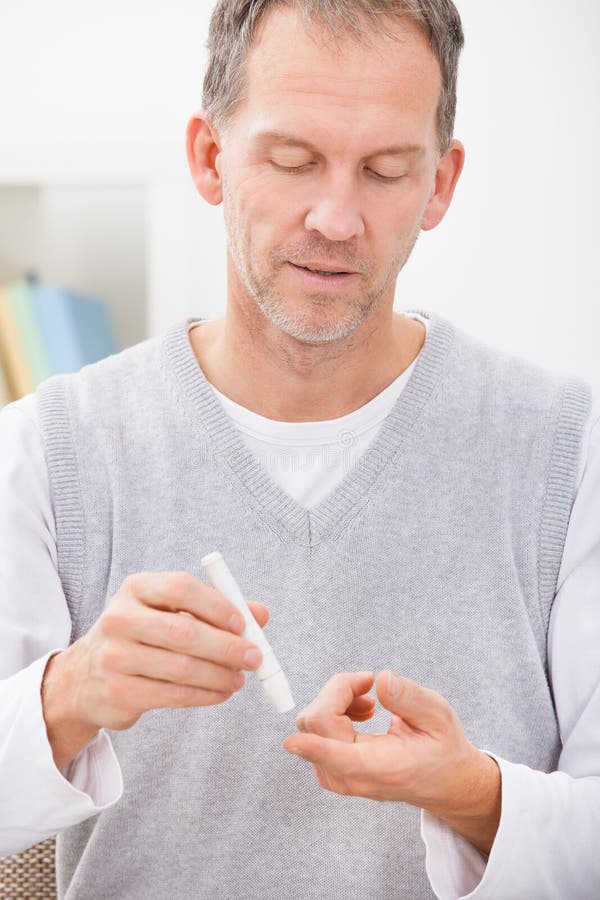 Man Examining Blood Sugar Level Stock Image - Image of illness ...