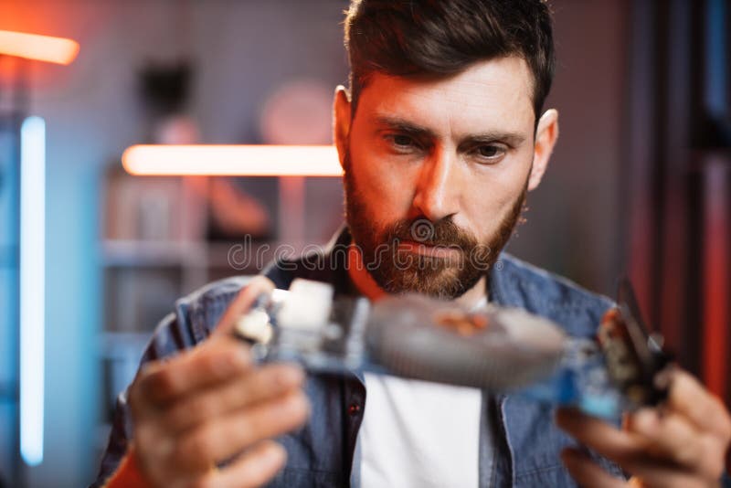 Man Examining Problem of Non Working Display Card Stock Photo - Image ...