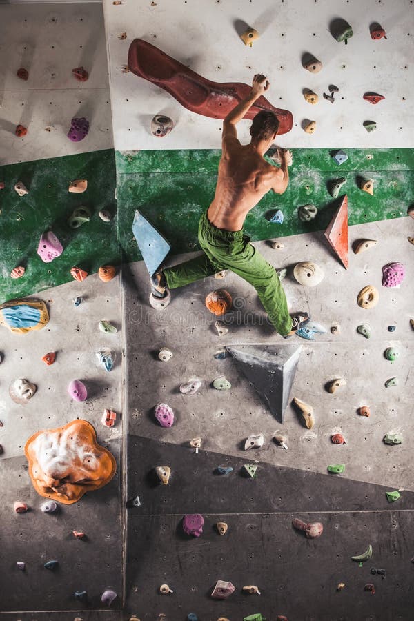 Man Exercise Bouldering and Climbing Indoor Stock Image - Image of ...