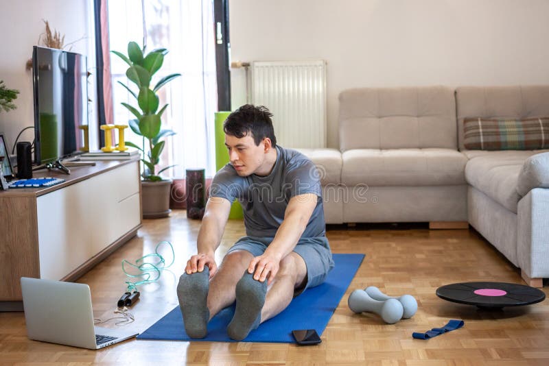 Man Exercising Doing Workout at Home Stock Image - Image of cozy ...