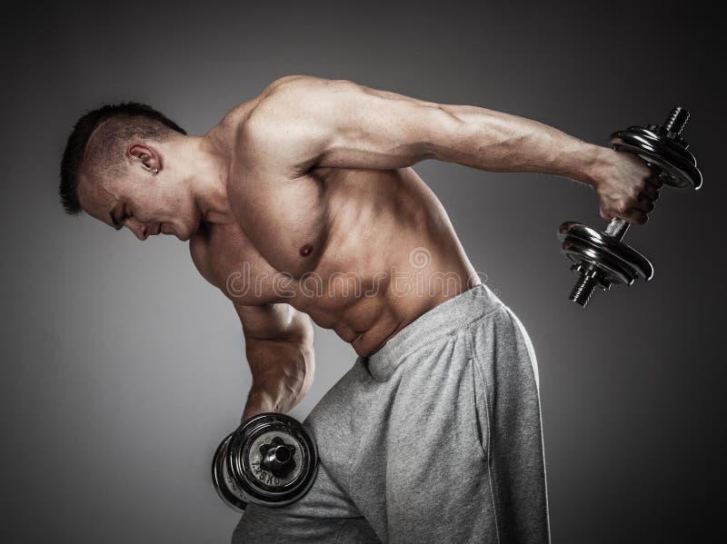 Man Exercising with Dumbbells Stock Photo - Image of human, dumbbells ...