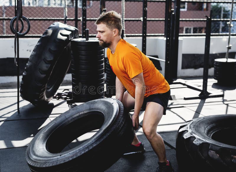 Man Exercising at Fitness Gym Stock Photo - Image of class, power ...
