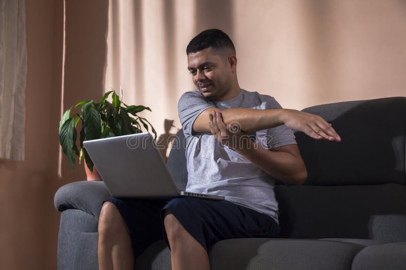Man Exercising in Front of the Computer. Stock Photo - Image of front ...