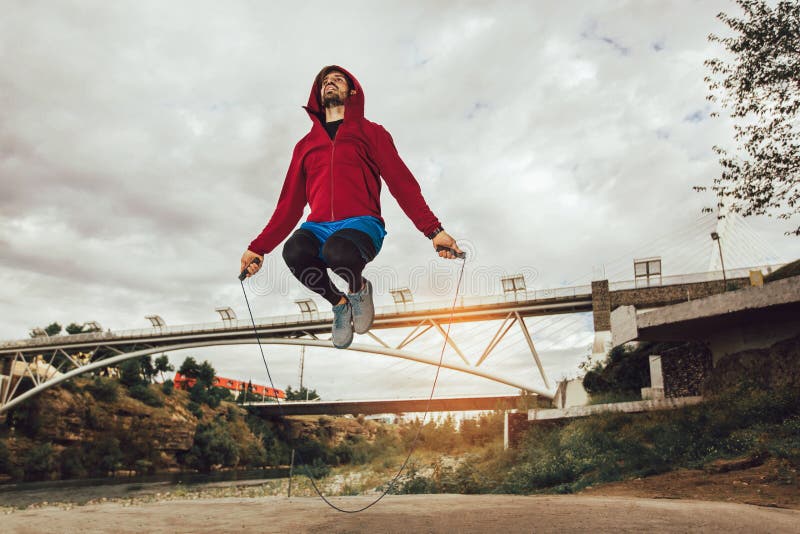 Man Exercising with Jump-rope Outdoors Stock Photo - Image of adventure ...