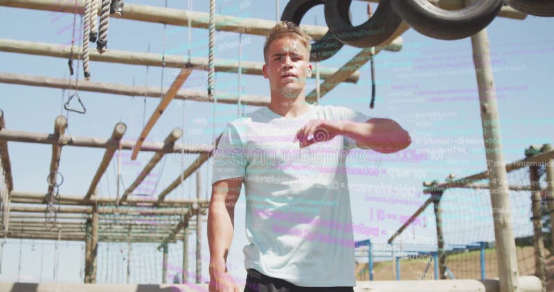 Man Exercising on Outdoor Obstacle Course with Digital Code Overlay ...