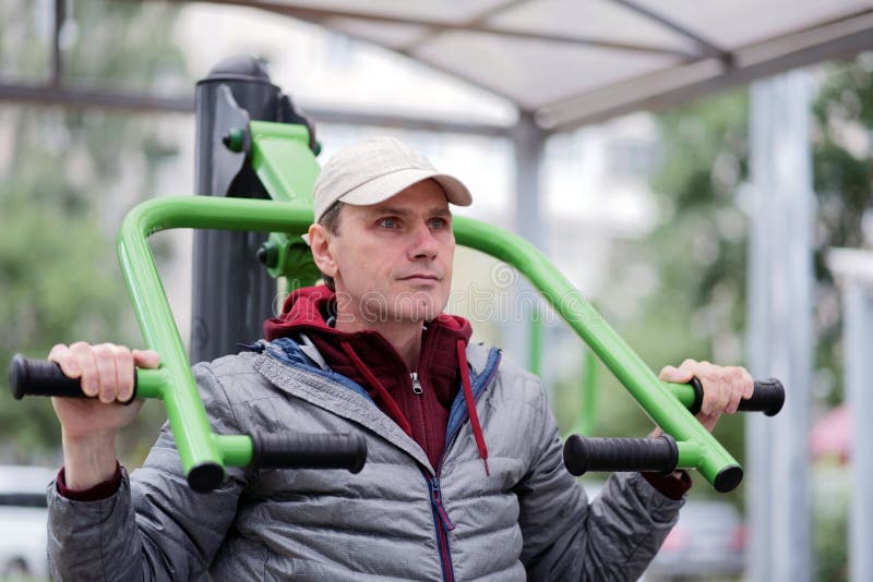 Man exercising outdoors stock image. Image of outdoors - 9090797