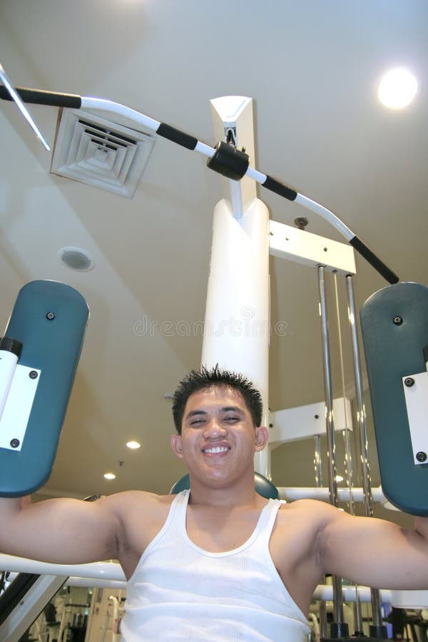 Man exercising smiling stock image. Image of male, muscle - 7166995