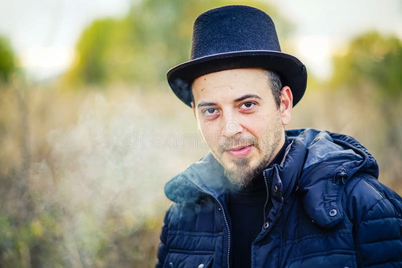 Man exhaling smoke stock photo. Image of exhale, portrait - 103415410