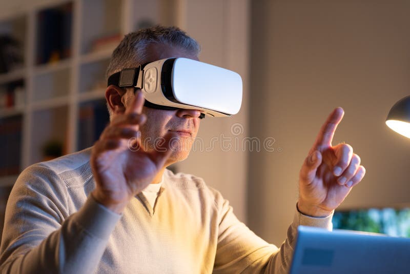Man Experiencing Virtual Reality at Home Stock Image - Image of ...