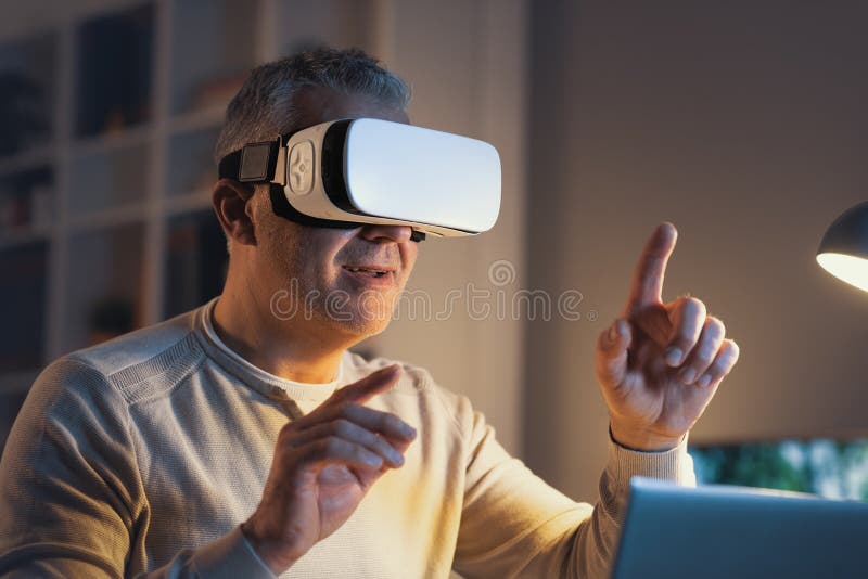 Man Experiencing Virtual Reality at Home Stock Image - Image of people ...