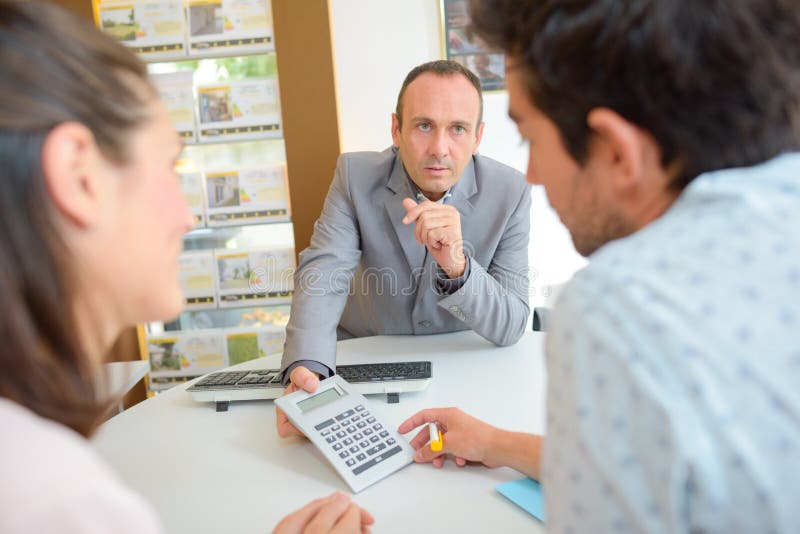 Man Explaining Something To Clients on Foreground Stock Image - Image ...