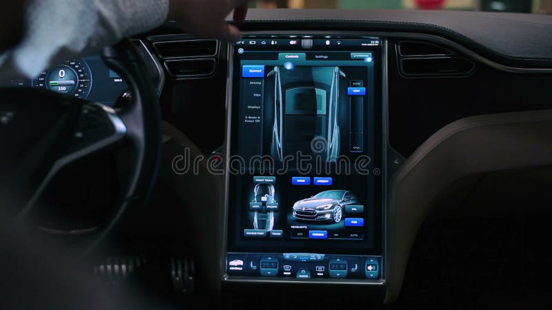 Man Explore on-boar Computer Inside Electric Car Stock Footage - Video ...