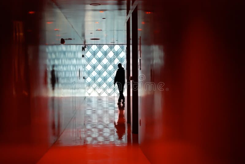 Man Exploring a Minimalist Modern Red Room Interior Stock Image - Image ...