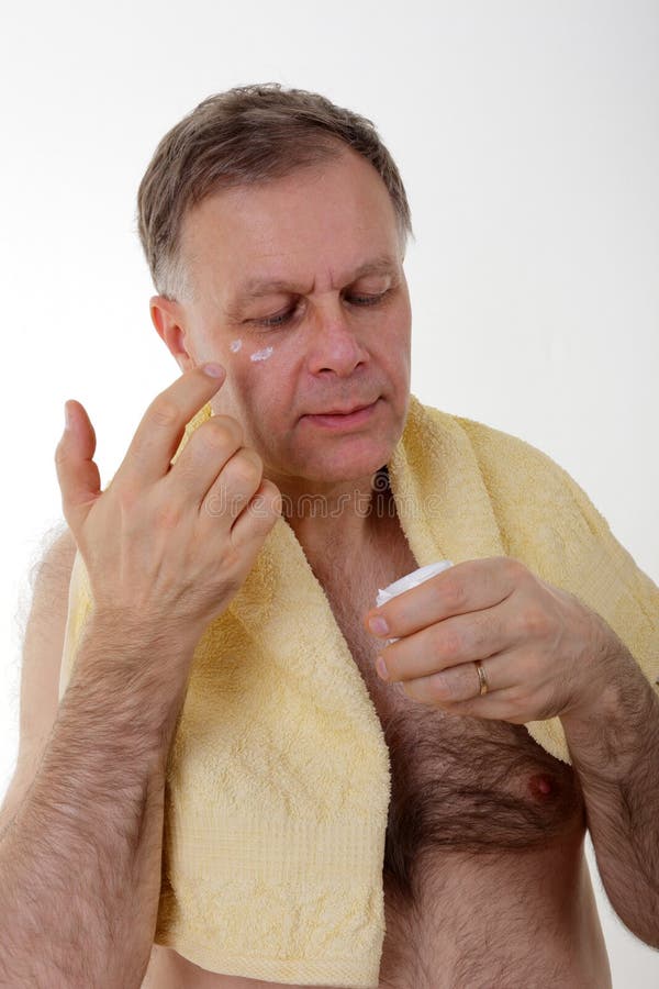 Man with face cream stock photo. Image of adult, portrait - 25110434