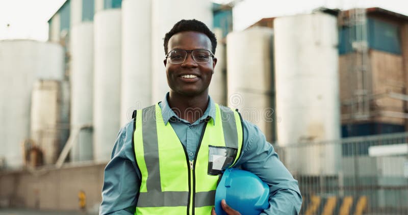 Man, Face and Engineering with Hard Hat at Construction Site or ...