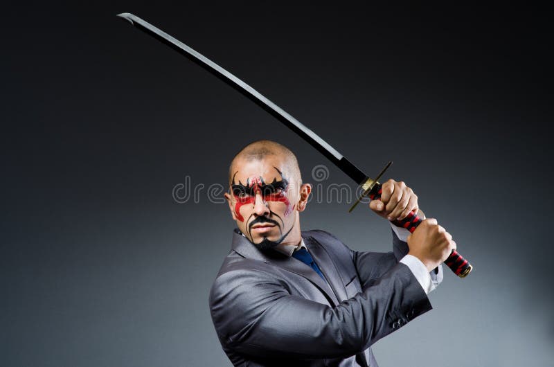 Man with face paint stock image. Image of katana, competition - 33494401