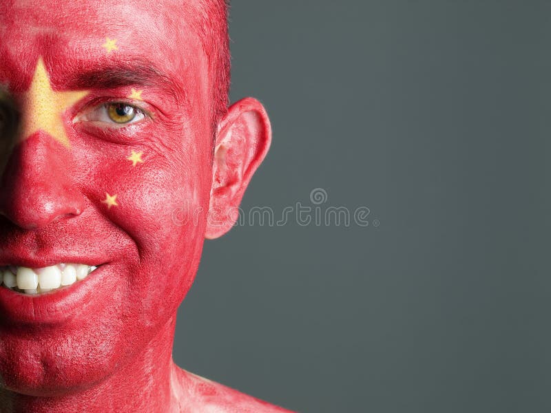 Man Face Painted with the Flag of China. Stock Photo - Image of ...