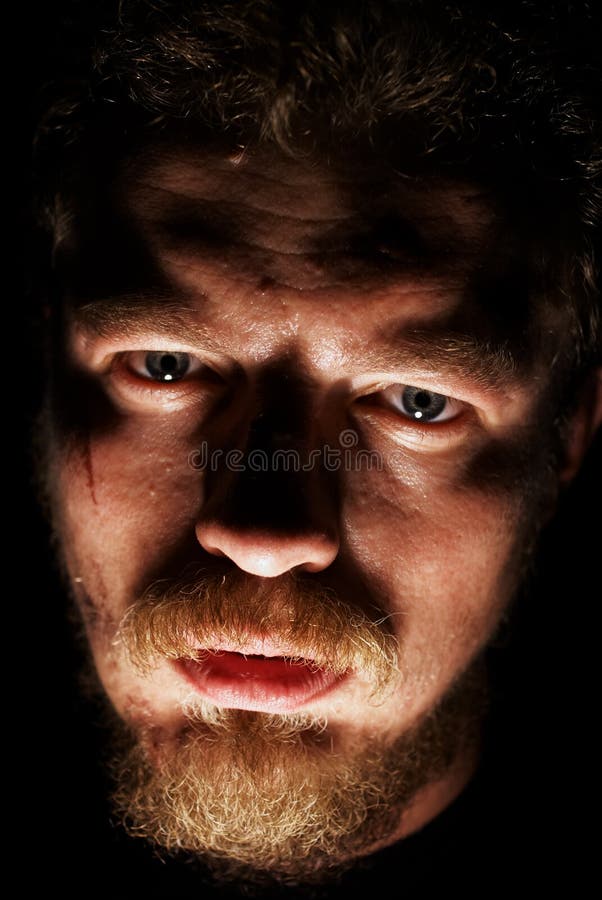 Scary Spooky Face in the Shadow Stock Photo - Image of annoyed, moody ...