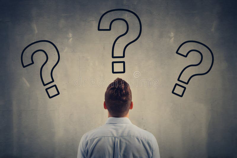 Man Faces Three Question Marks, Symbolizing Curiosity and Contemplation ...