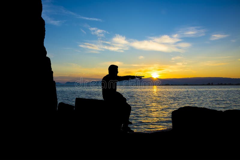 Man facing the horizon stock image. Image of ocean, alone - 70017801